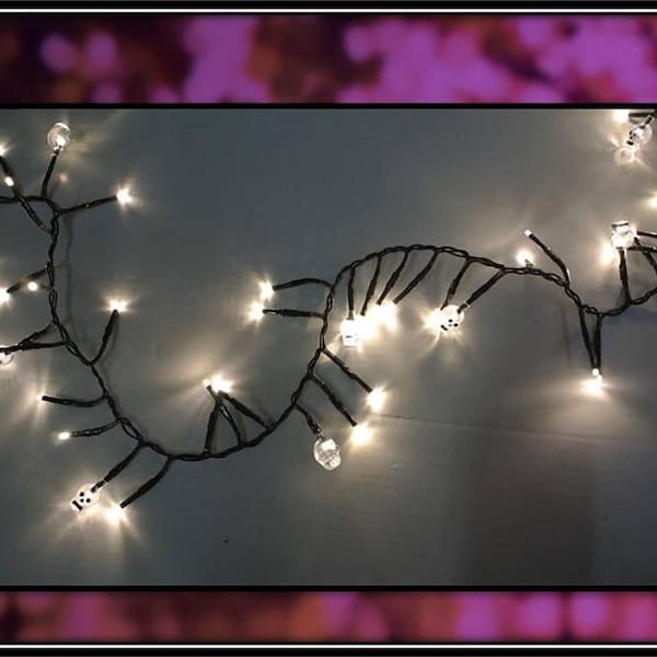 Celebrations Halloween Warm White 120 ct 9 ft. LED Prelit Skull Lights ...